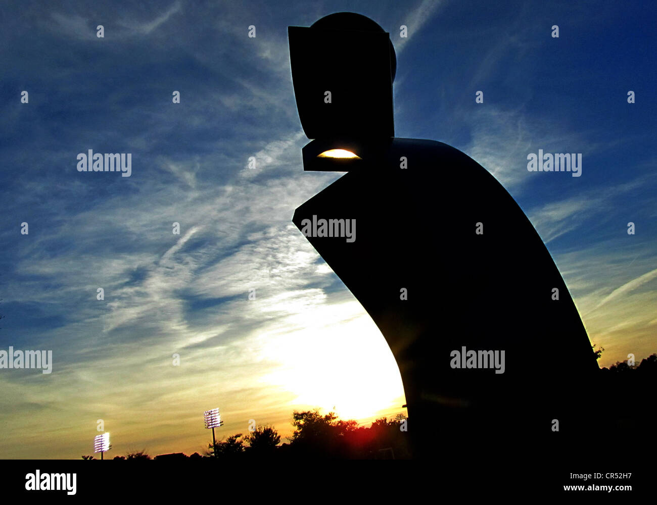 Statue at sunset Stock Photo - Alamy