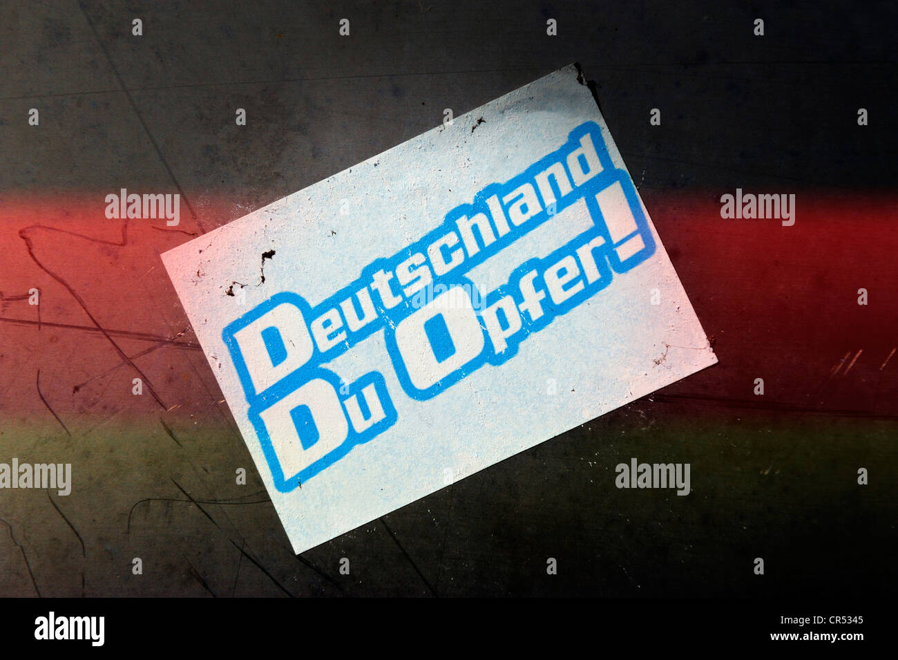 Sticker on a wall, "Deutschland, Du Opfer!", German for "Germany, you ...