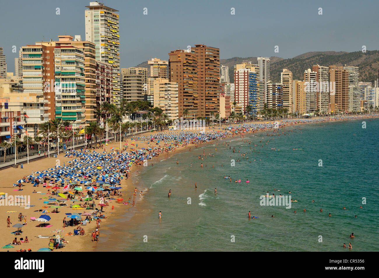 High-rise buildings and bathers on the Playa Levante beach, mass ...