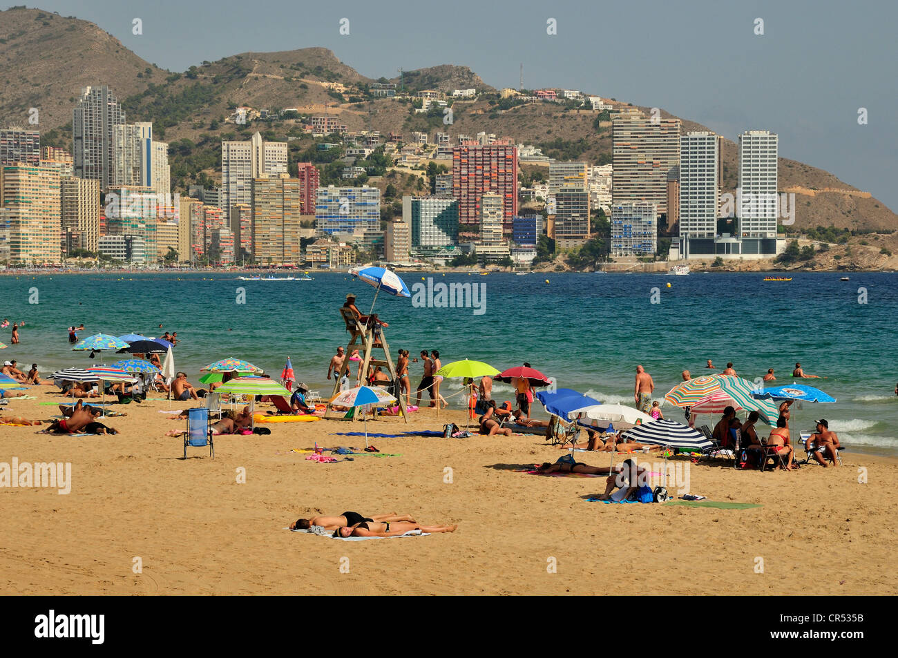 High-rise buildings and bathers on Playa Levante beach, mass tourism ...
