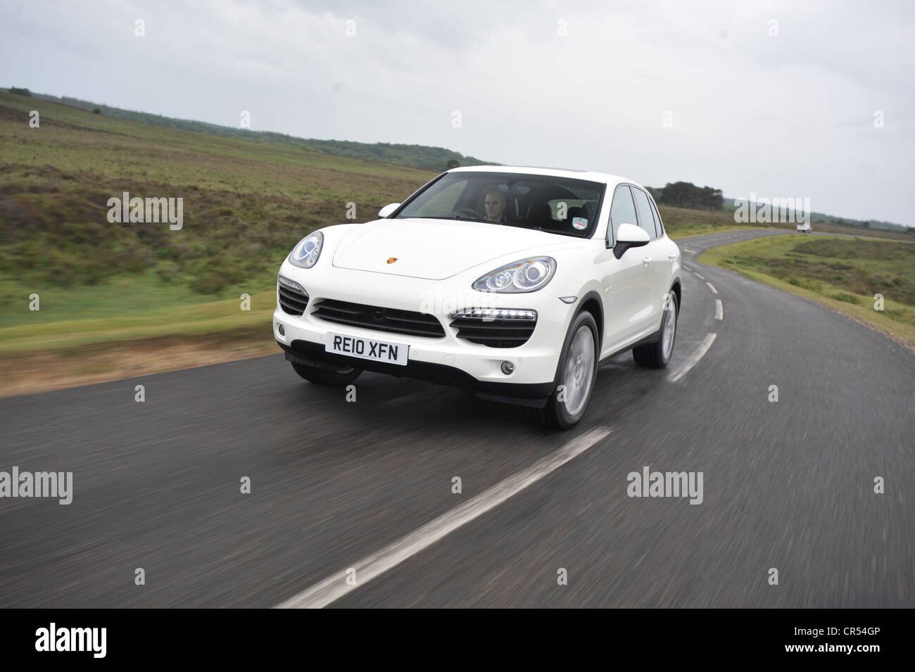 Porsche Cayenne hybrid performance SUV 4x4 driving Stock Photo - Alamy