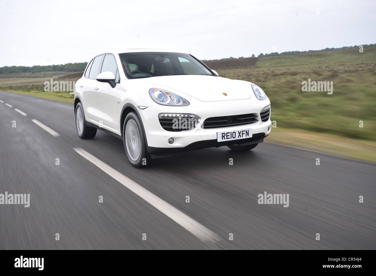 Porsche Cayenne hybrid performance SUV 4x4 driving Stock Photo - Alamy