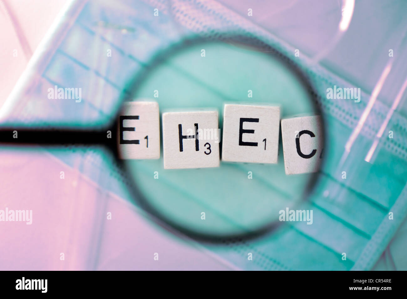 Lettering EHEC under a magnifying glass, symbolic image for search for ...