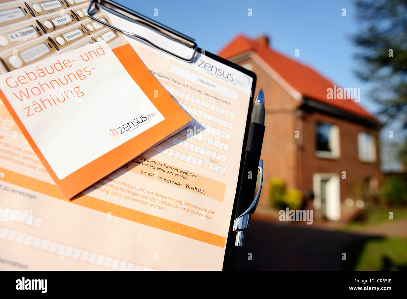 Clipboard with the questionnaire of the Census 2011, building and ...