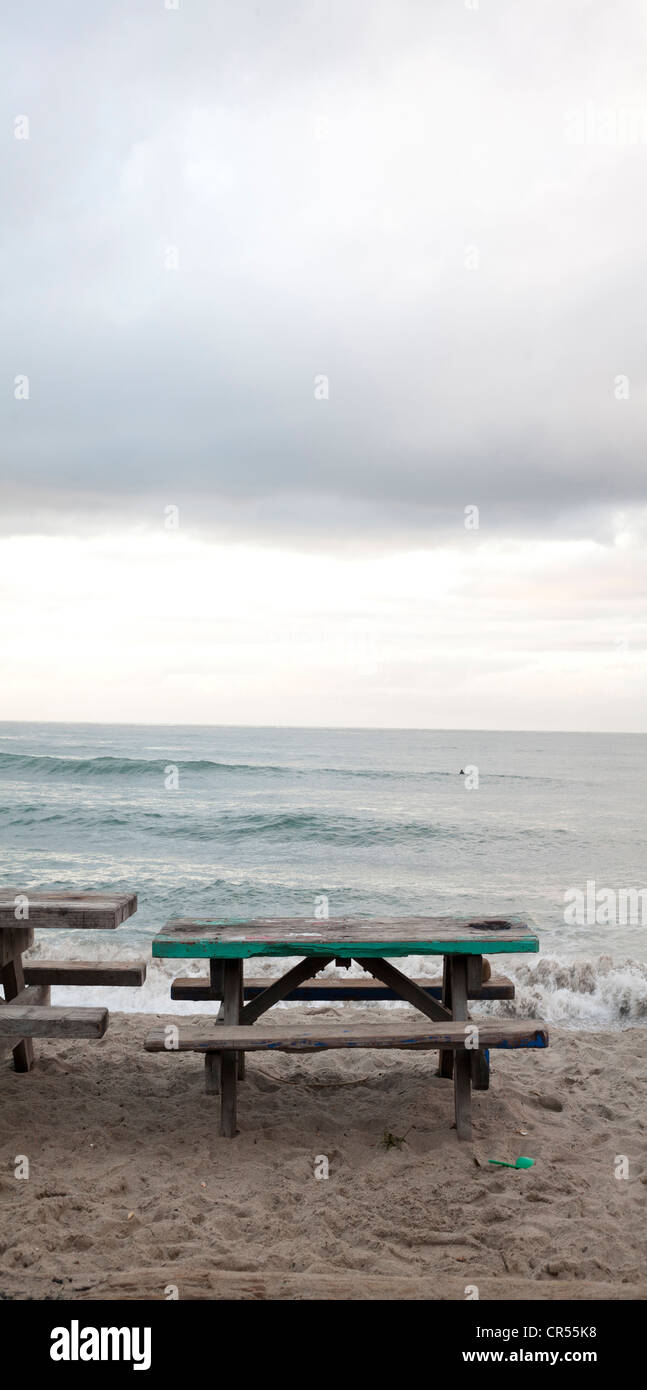 Picnic tables near ocean Stock Photo - Alamy