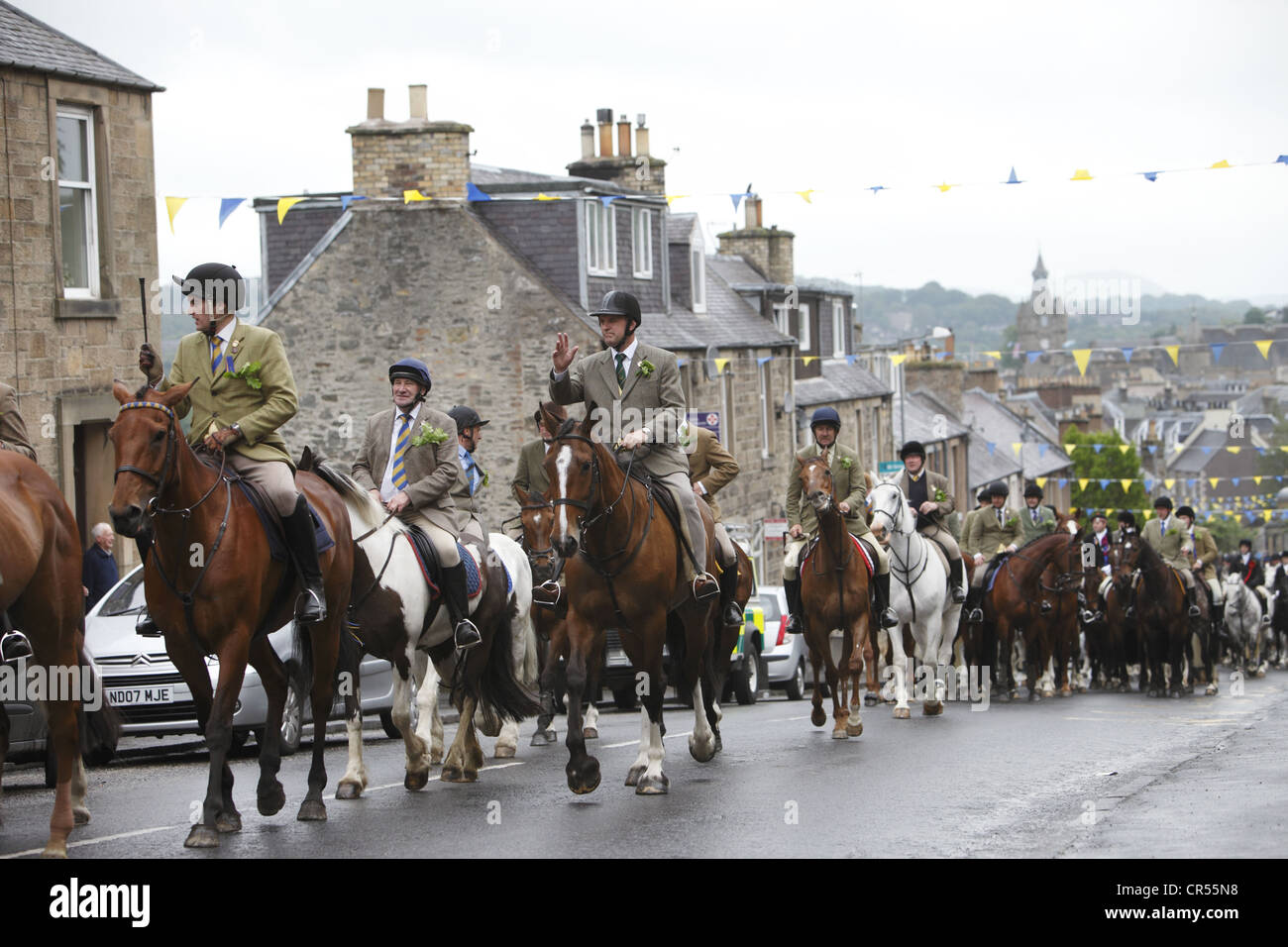 Supporters of the Cornet rideout in the procession to the Moor during ...