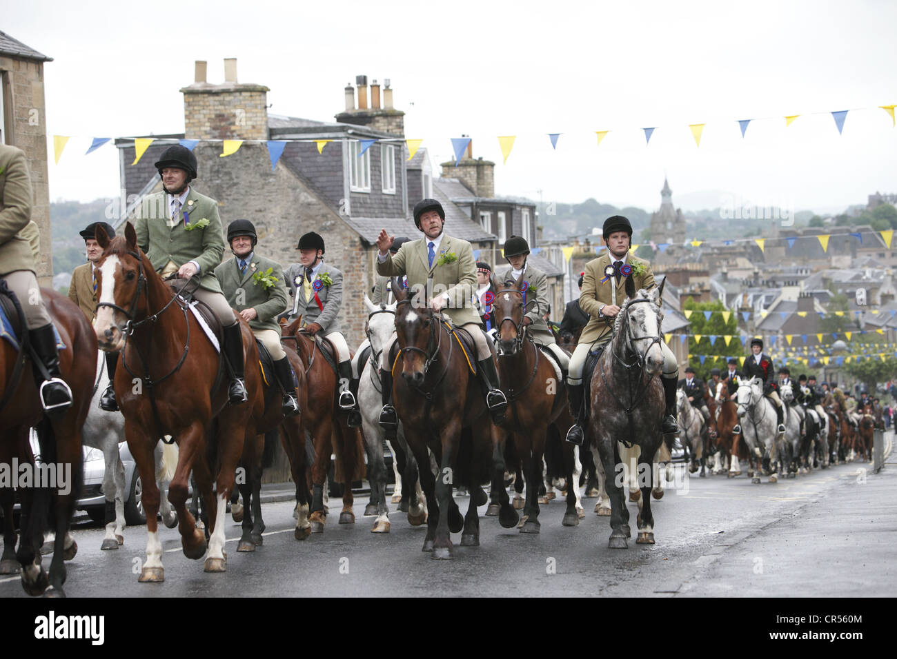Supporters of the Cornet rideout in the procession to the Moor during ...