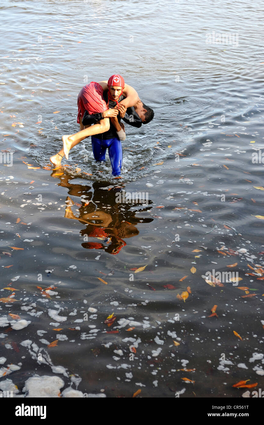 Red Cross lifeguard exercising in the Bahia de Jiquilisco bay ...