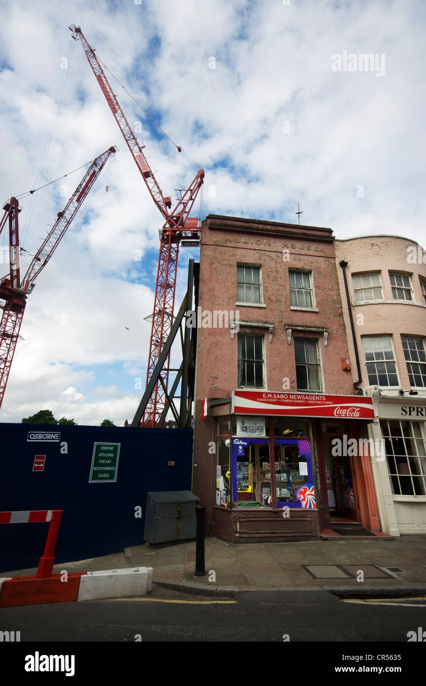 Greenwich row of old shops beside building development Stock Photo - Alamy