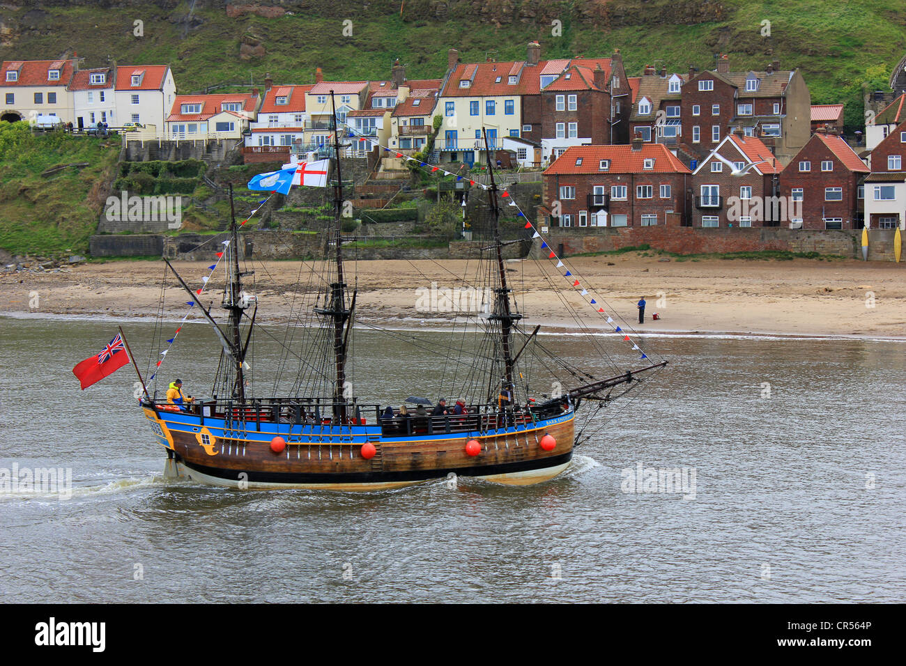 England North Yorkshire Whitby Pirate cruise boat returning to harbour ...