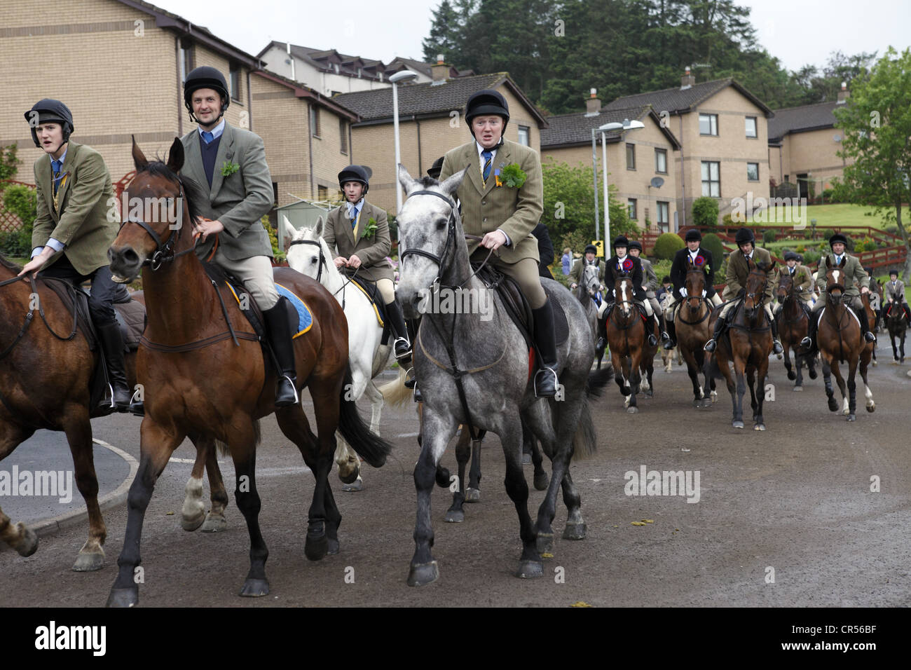 Supporters of the Cornet rideout in the procession to the Moor during ...