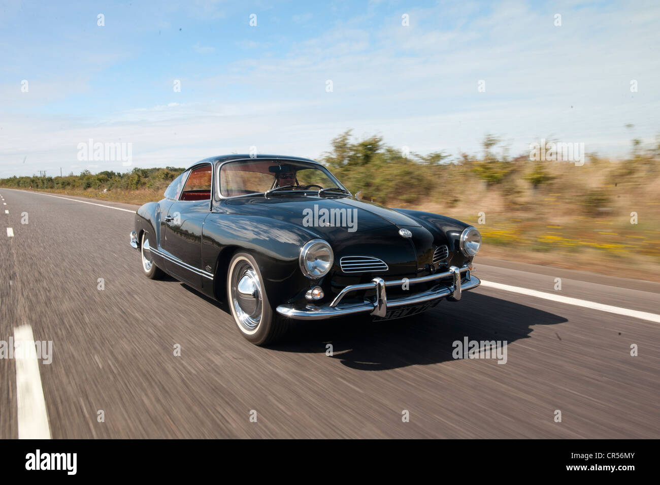 Volkswagen Karmann Ghia type 1 driving Stock Photo - Alamy