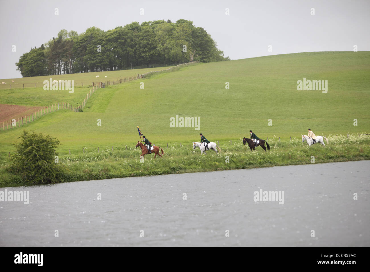 The Cornet & his supporters ride the outlying marches during Hawick ...