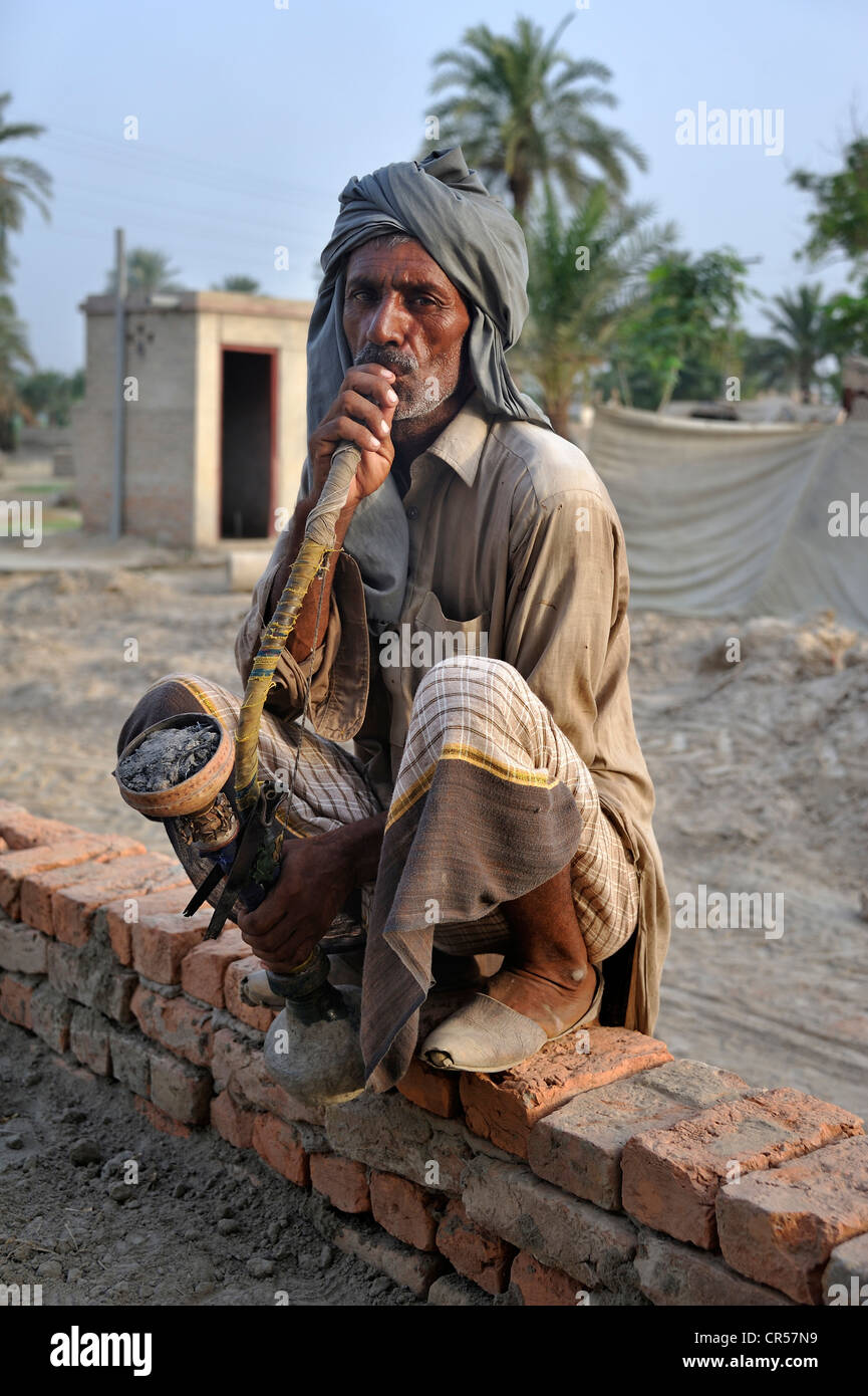 Smoking a large pipe hi-res stock photography and images - Alamy