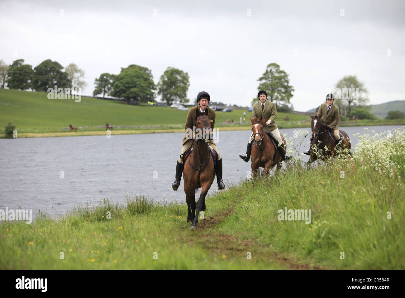 The Cornet's supporters ride the outlying marches during Hawick Common ...