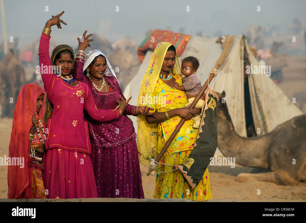 India, Rajasthan State, Pushkar, camel fair, women dancing during the ...