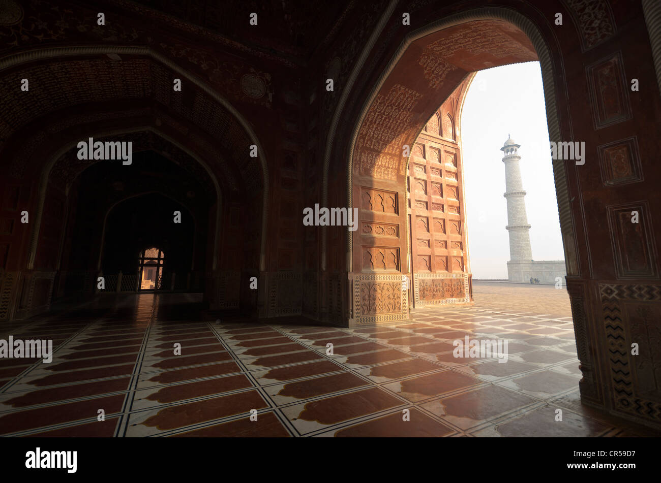 Taj Mahal, UNESCO World Heritage, seen through one of the huge gates of ...