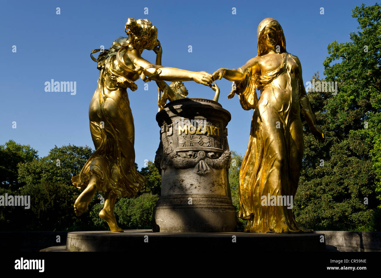 Dancing golden statues of the Mozart monument, Dresden, Saxony, Germany ...