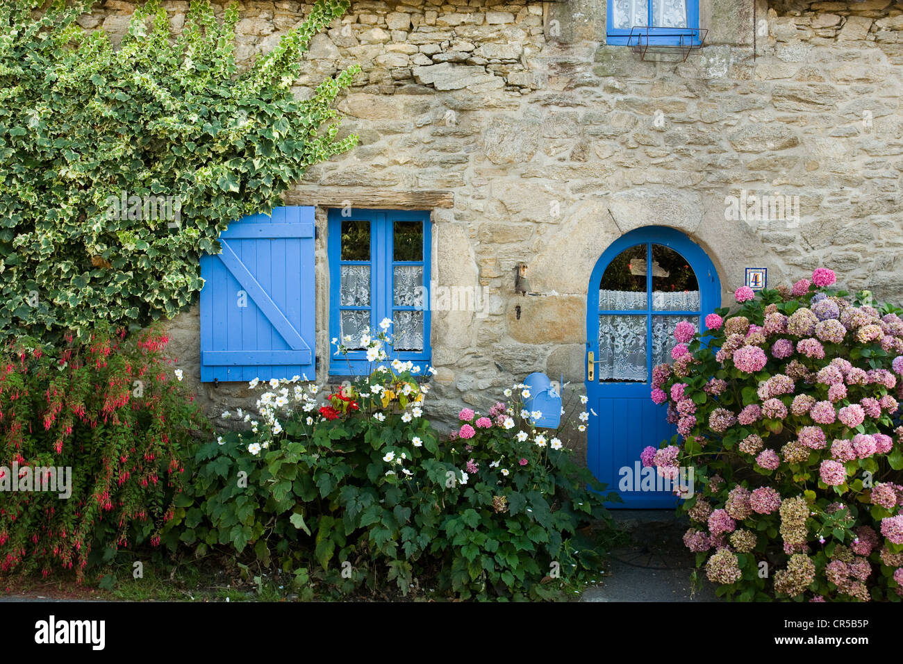 France, Loire Atlantique, Guerande, house decorated with flowers in the ...