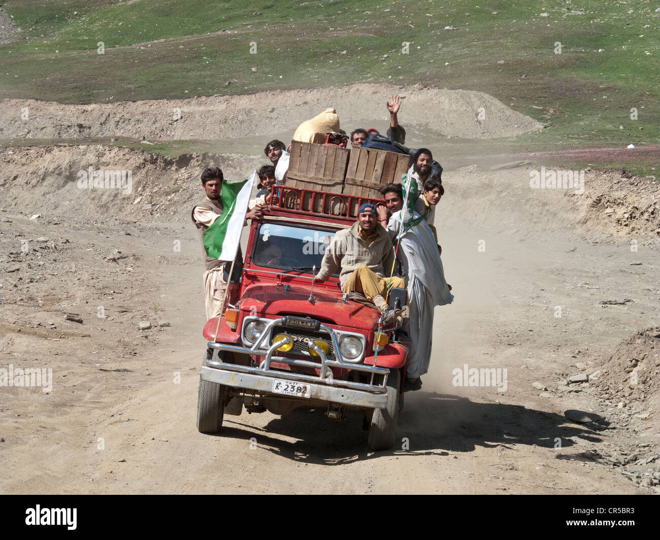 Overloaded jeep after crossing the Babusar Pass on the way down to ...