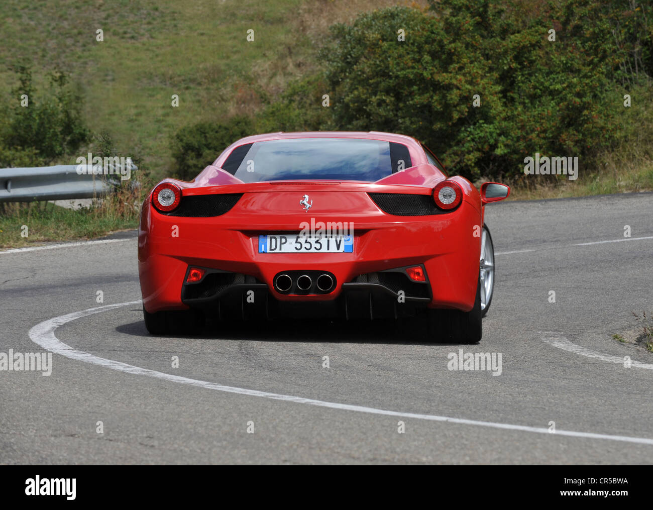 2011 Ferrari 458 Italia red Italian supercar in Modena cornering Stock ...