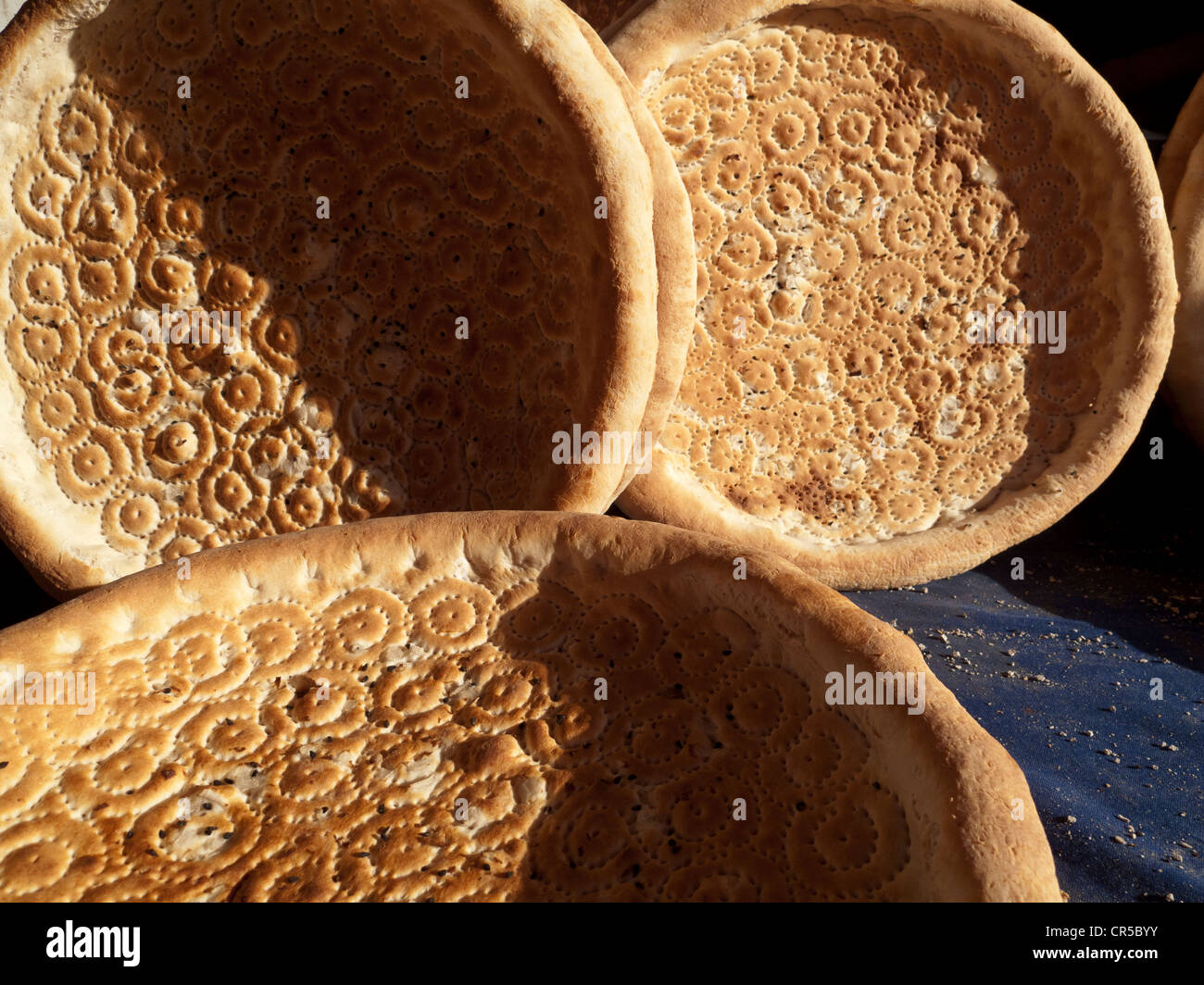 Uigur bread, made in the tandoori oven and sold in the streets of ...