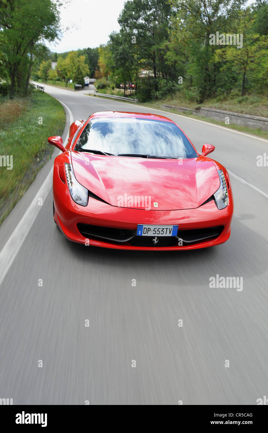 2011 Ferrari 458 Italia red Italian supercar in Modena driving Stock ...