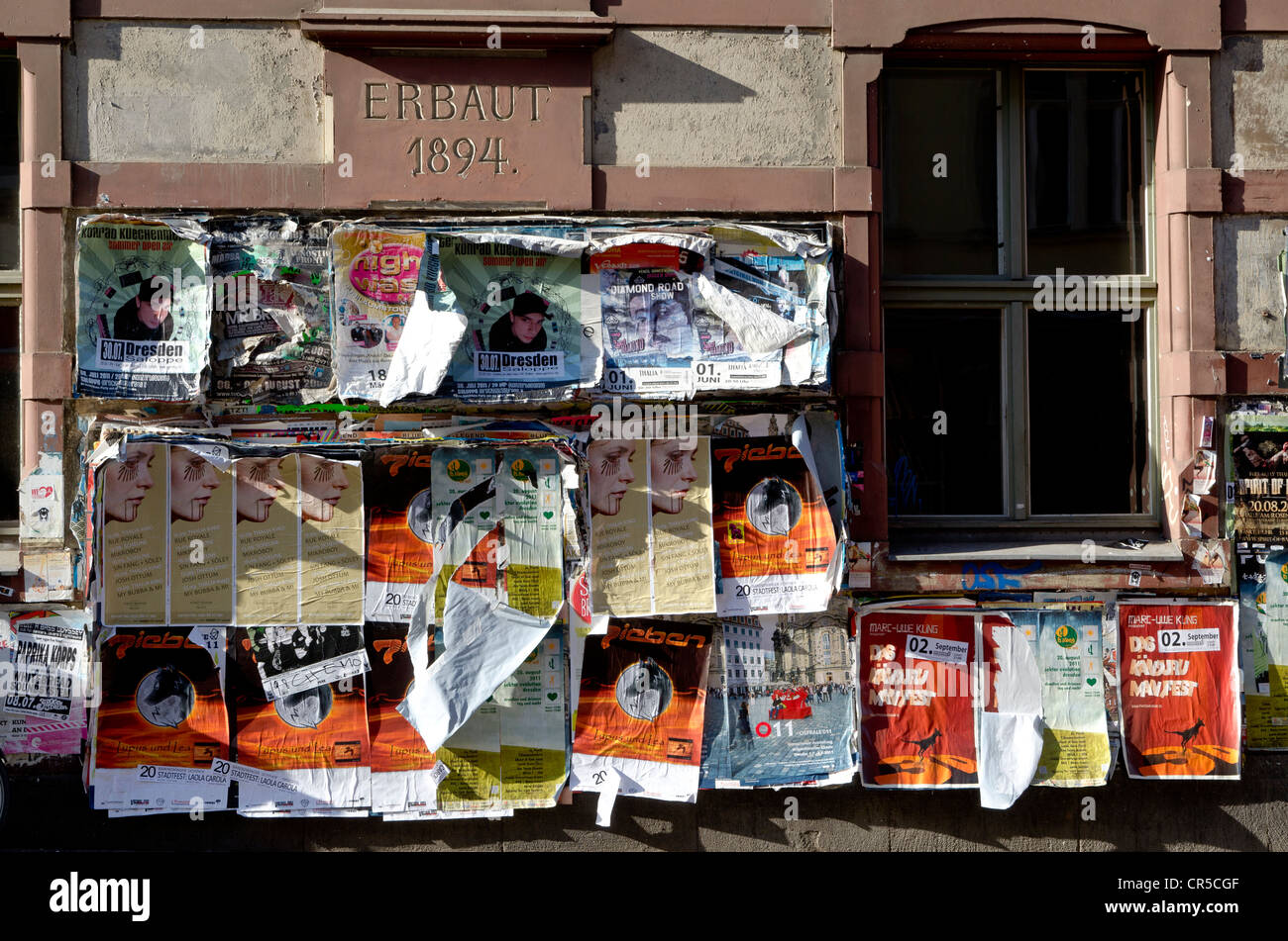 Advertising posters on a historic building in Neustadt, Dresden, Saxony ...