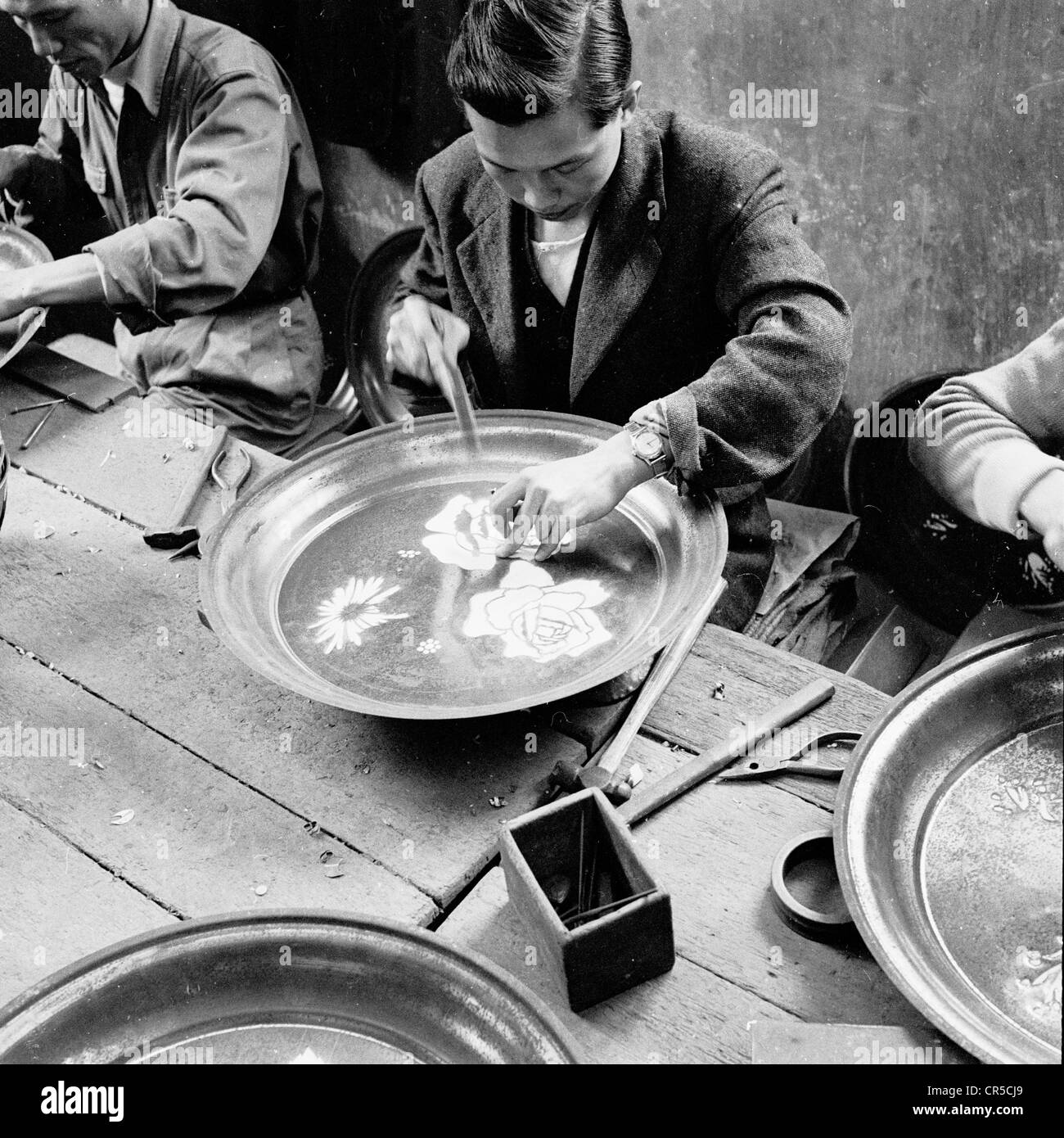 Hong kong workers 1950s hi-res stock photography and images - Alamy