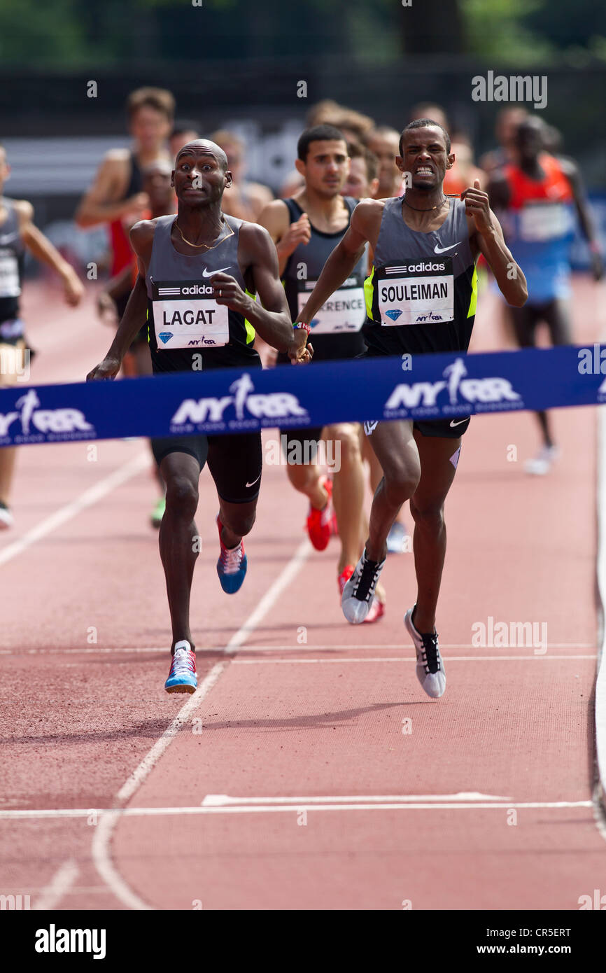 Bernard Lagat (USA) defeating Ayanieh Souleiman (DJI) in the Men 1500m ...
