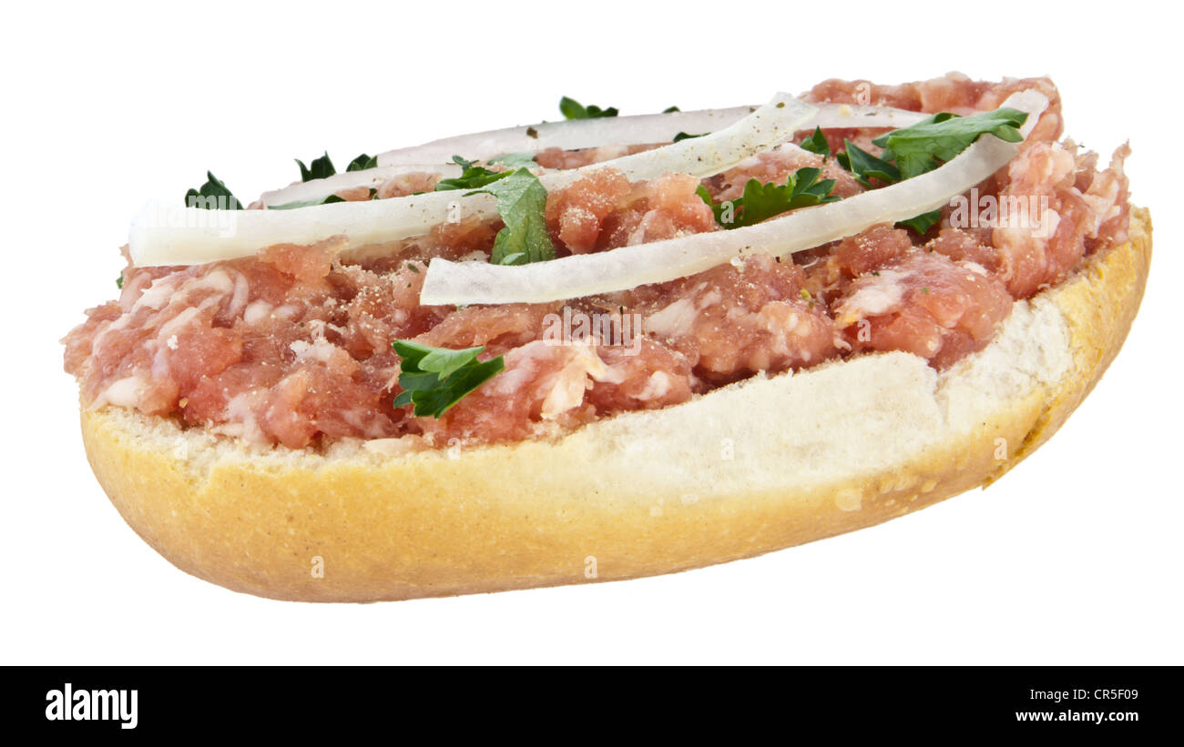 Halved roll with minced pork (In German called Mettbrötchen) isolated ...