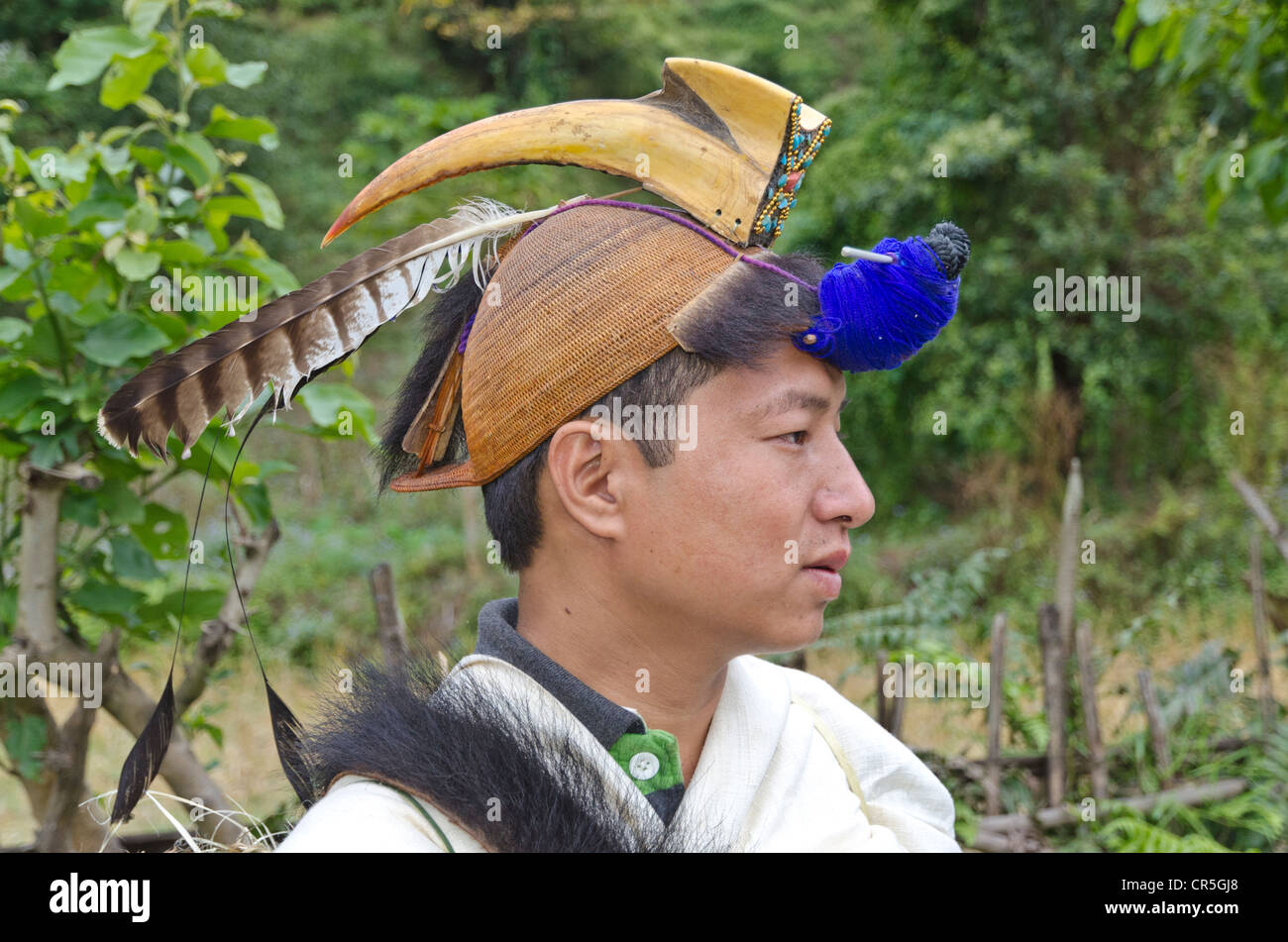Bridegroom of the Nishi tribe with his traditional decoration at his ...