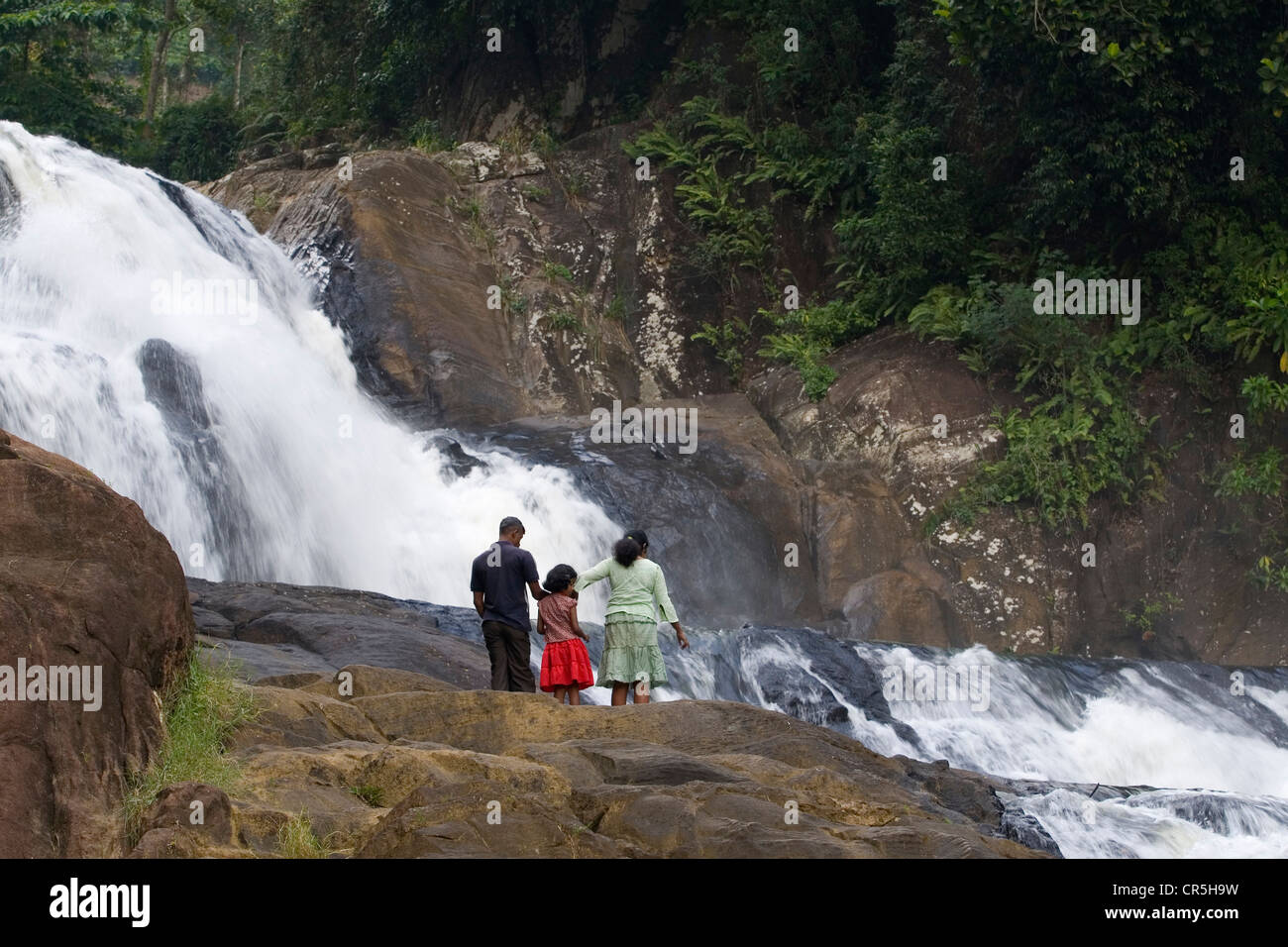 Group admiring the Sathmala Falls on the Gin River, Sathmala, Southern ...