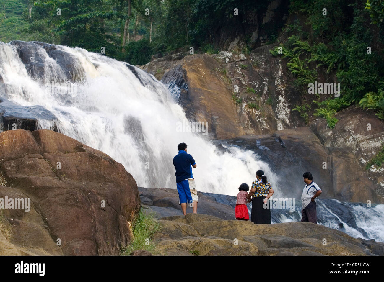 Group admiring the Sathmala Falls on the Gin River, Sathmala, Southern ...