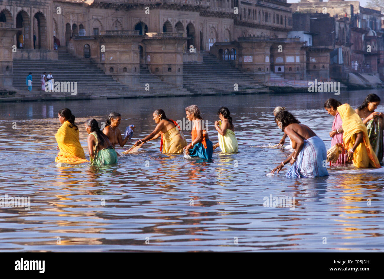 Pilgrims having a bath in the river Yamuna, Vrindaban, Uttar Pradesh ...