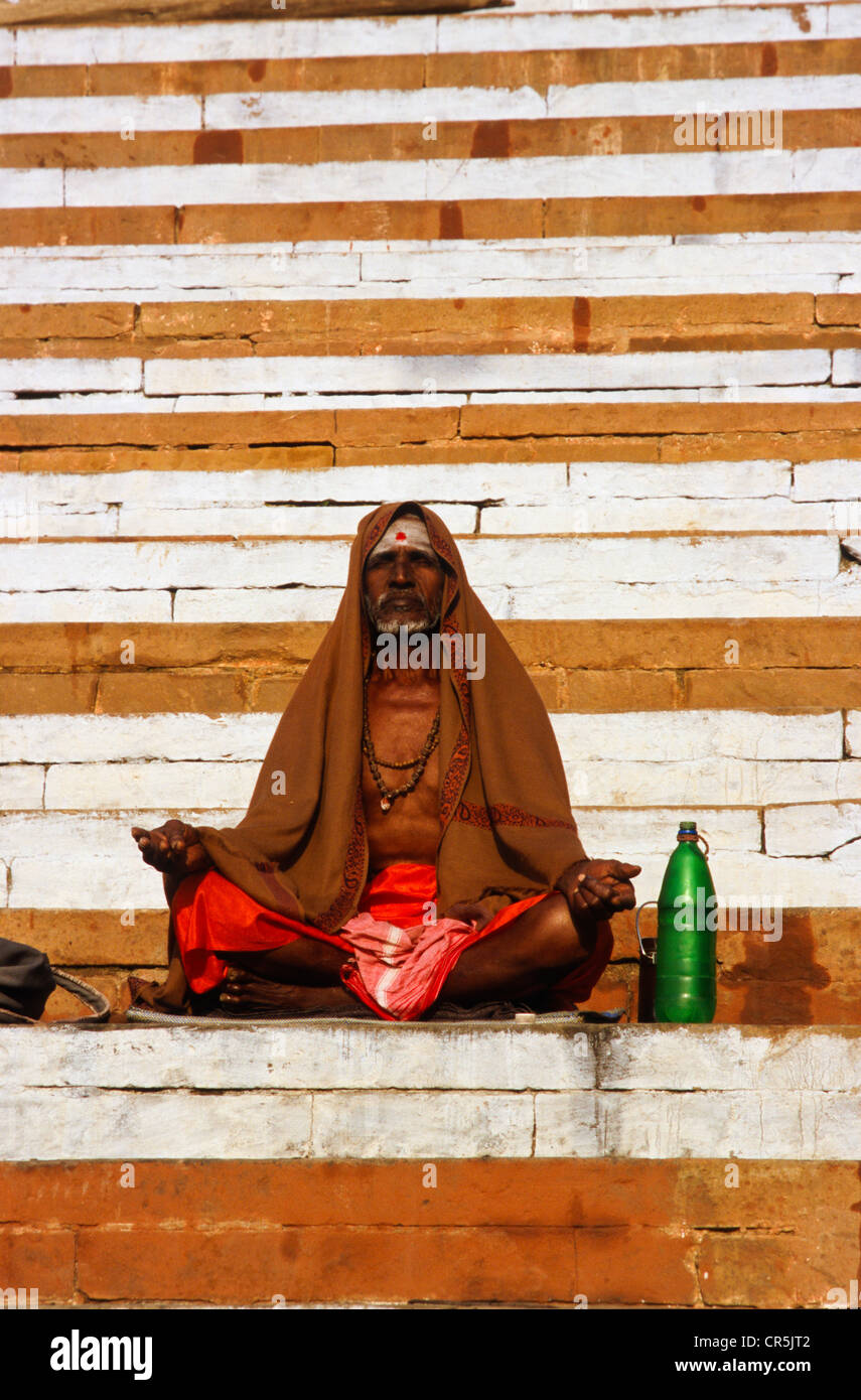 Sadhu meditating at the ghats of Varanasi, Uttar Pradesh, India, Asia ...