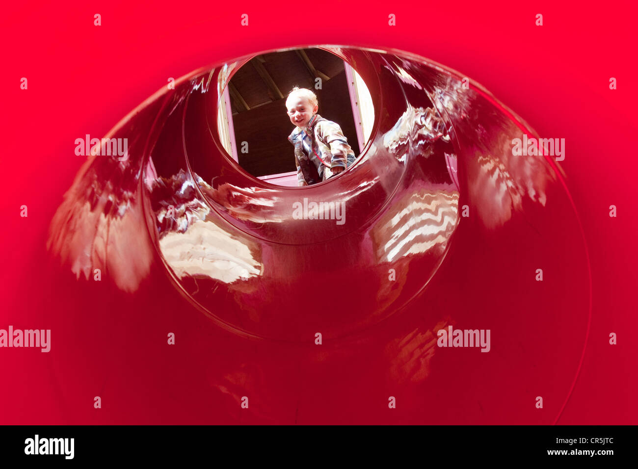 Red childrens slide at woodlands family theme park hi-res stock ...