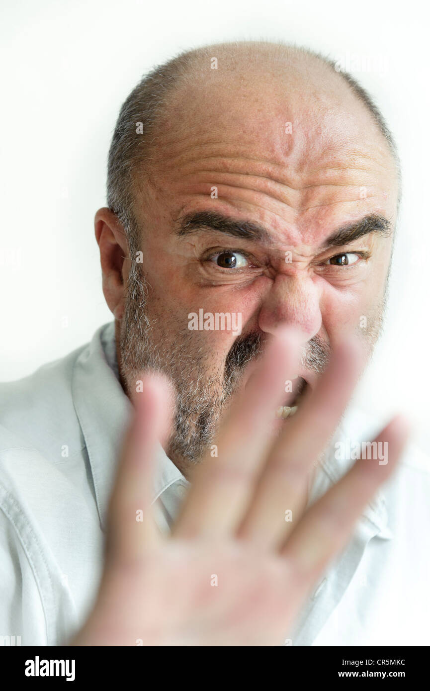 Angry man with outstretched hand Stock Photo - Alamy