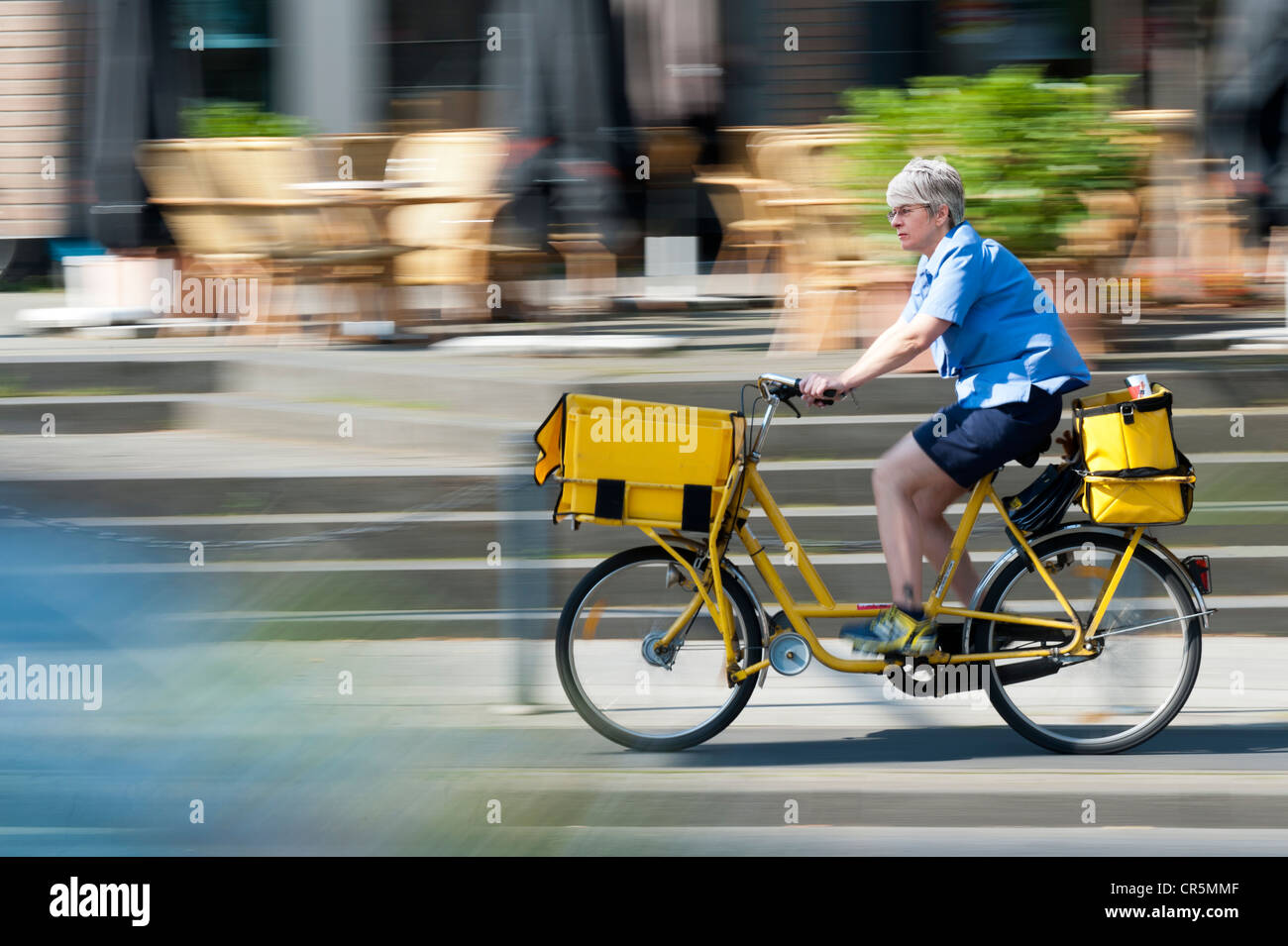 Female postman hi-res stock photography and images - Alamy