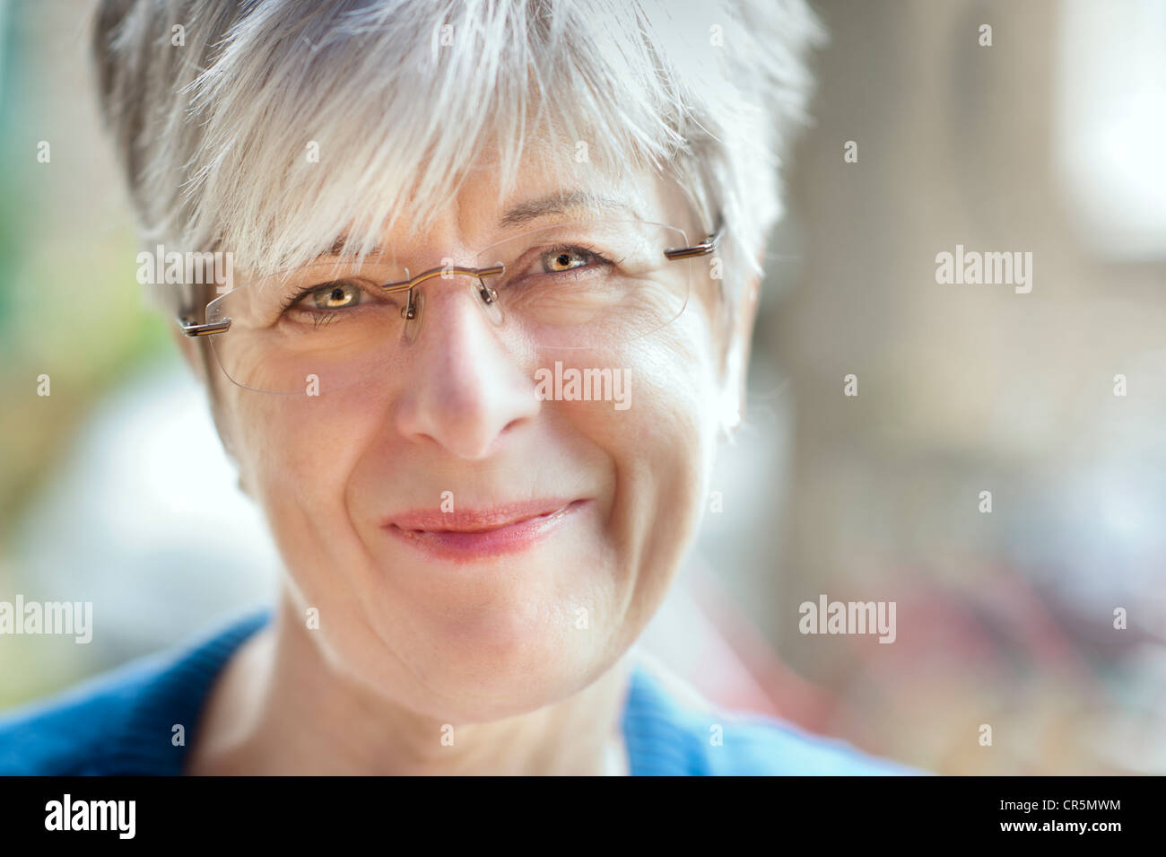 Smiling woman, 50 +, portrait Stock Photo - Alamy