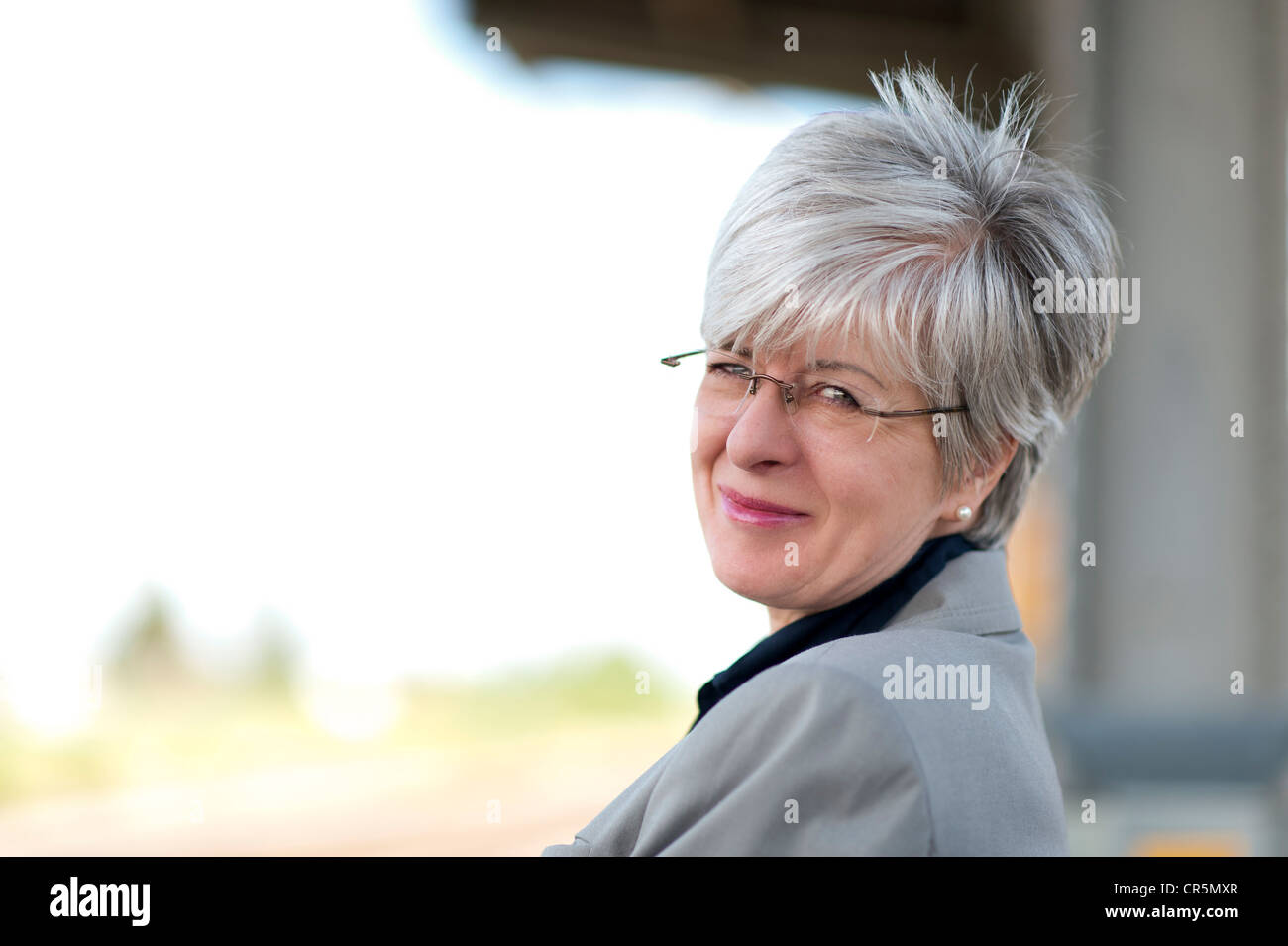 Woman, 50 +, smiling, portrait Stock Photo - Alamy