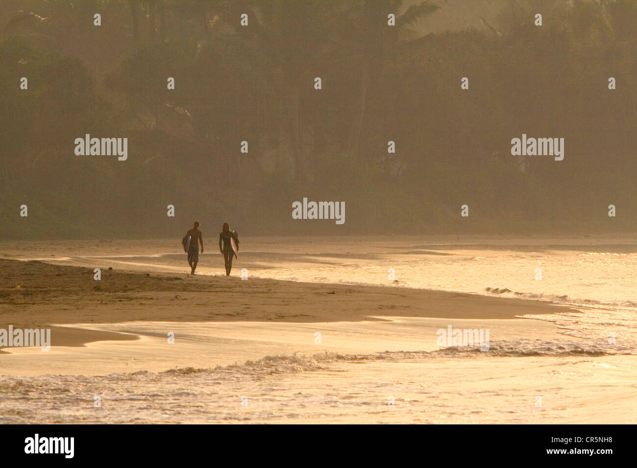 Surfers on the beach at the break known as Kabalana, Ahangama, Southern ...
