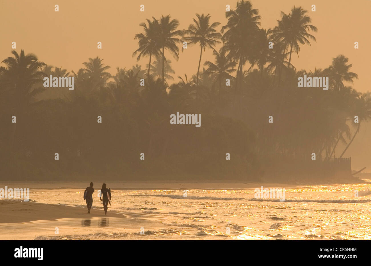 Surfers on the beach at the break known as Kabalana, Ahangama, Southern ...
