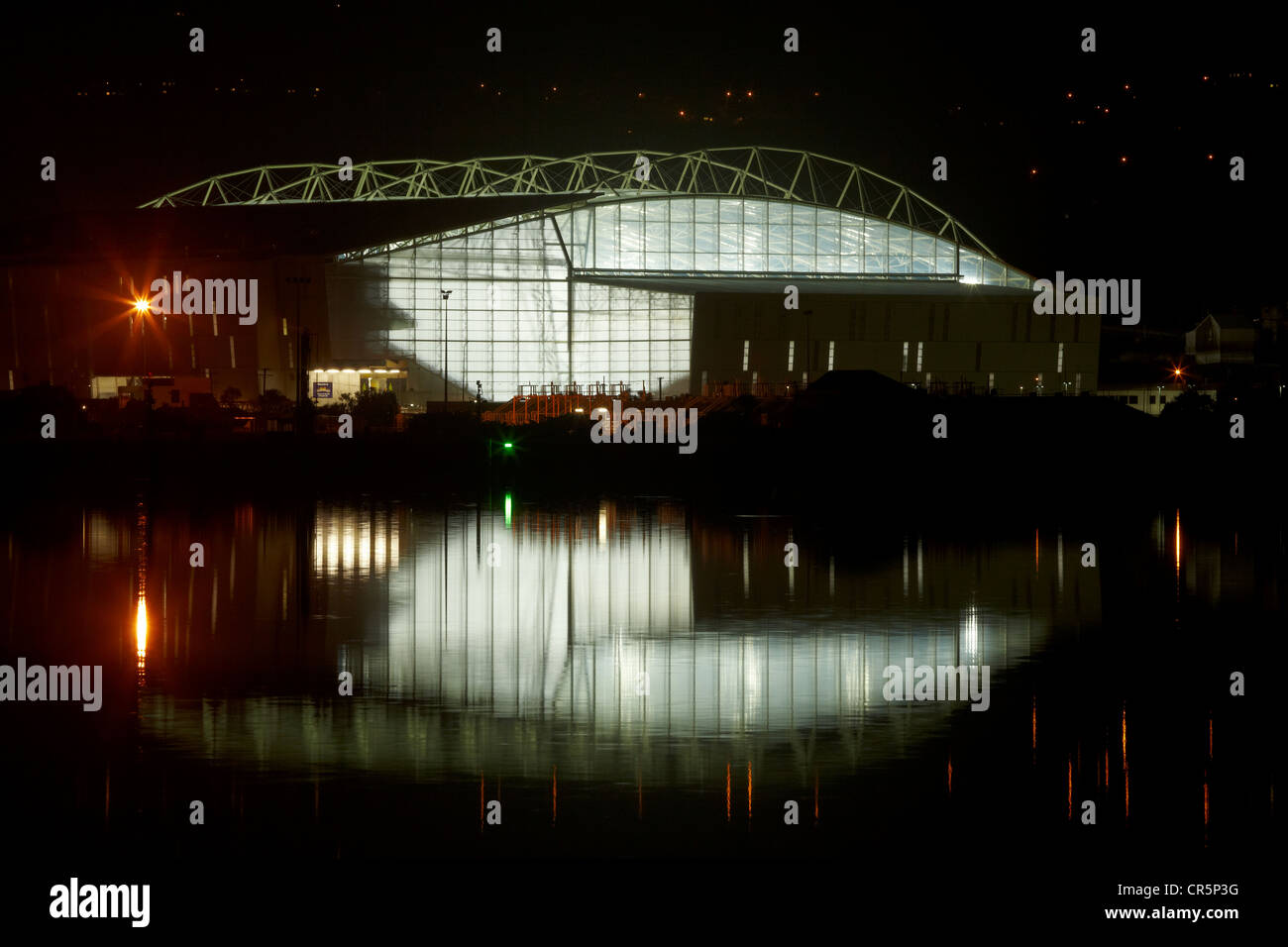 Forsyth Barr Stadium, reflected in Otago Harbour, Dunedin, South Island ...