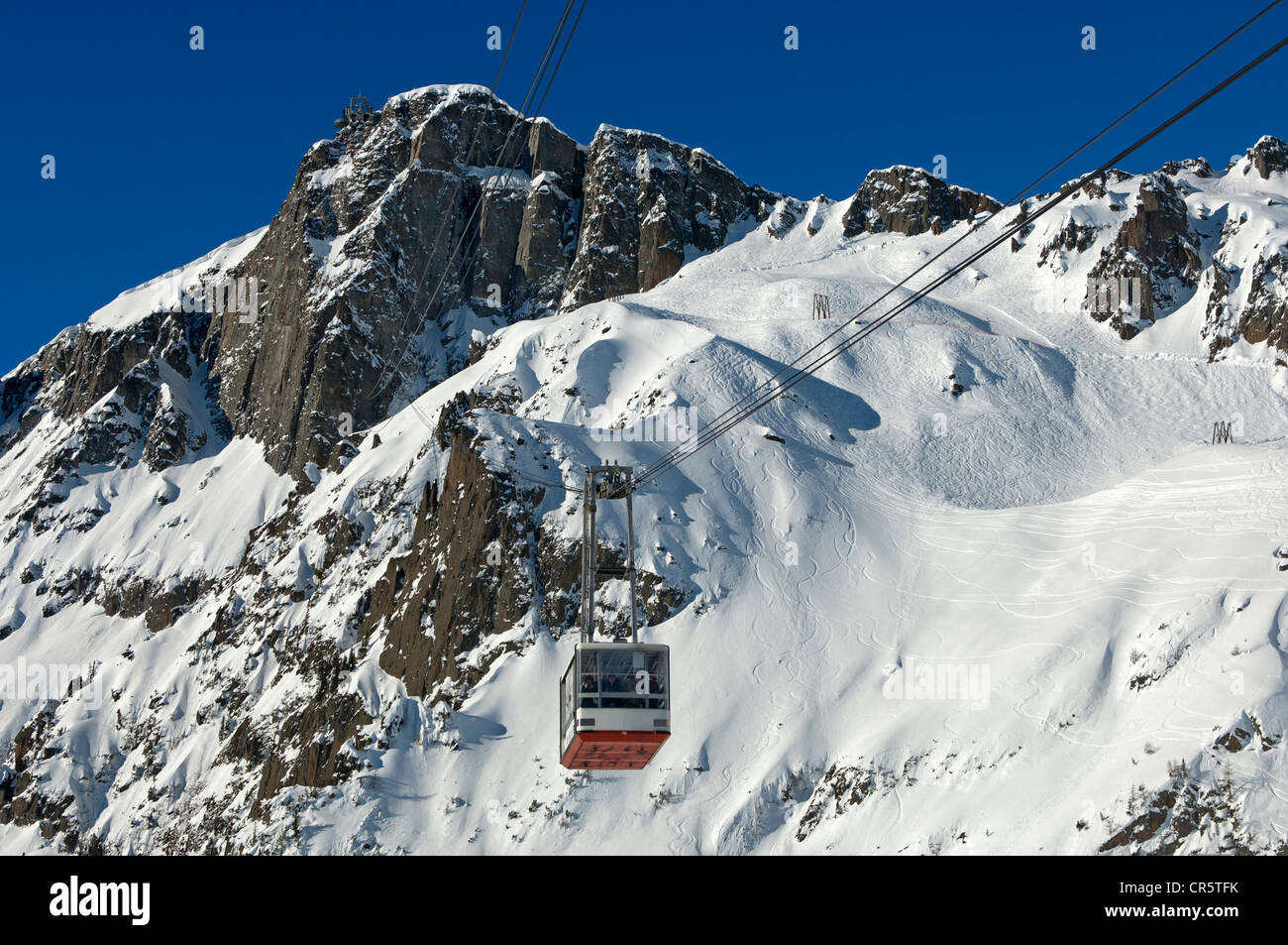 Cable car suspended between Plan Praz and the summit of Brevent ...