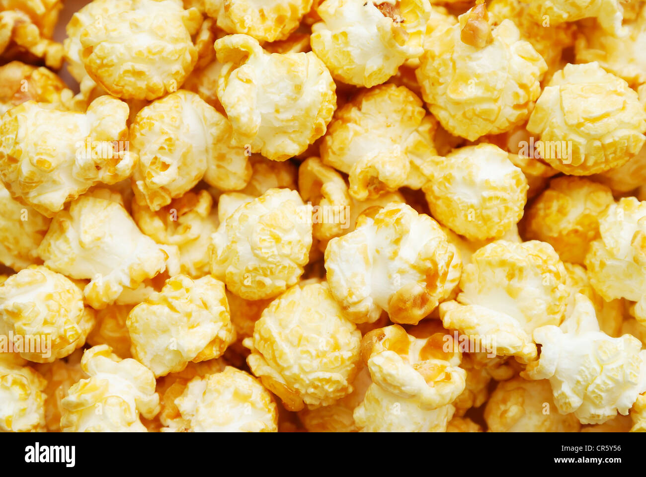 Heap of popcorn with caramel, top view Stock Photo - Alamy