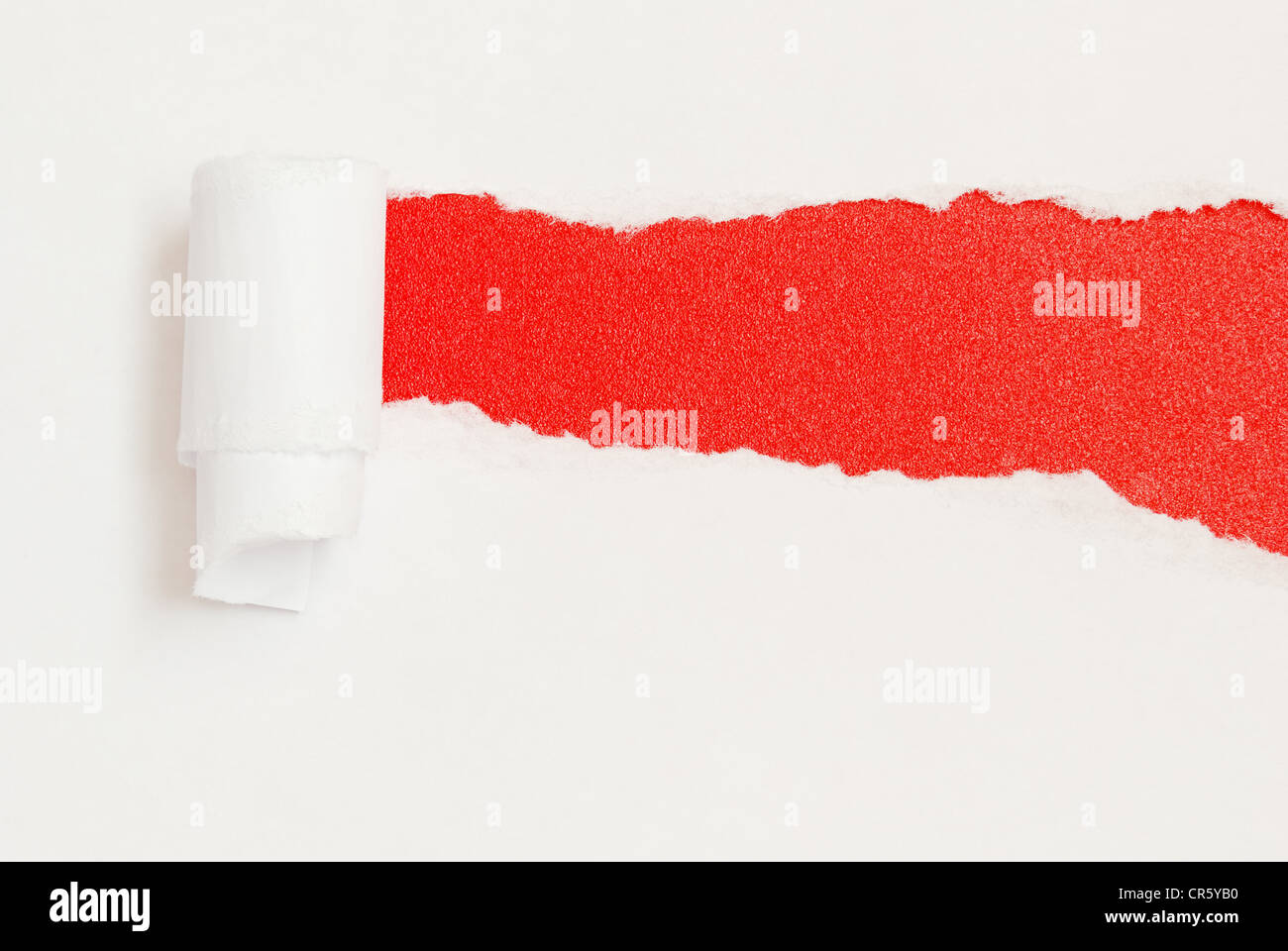 Ripped paper on red background Stock Photo - Alamy