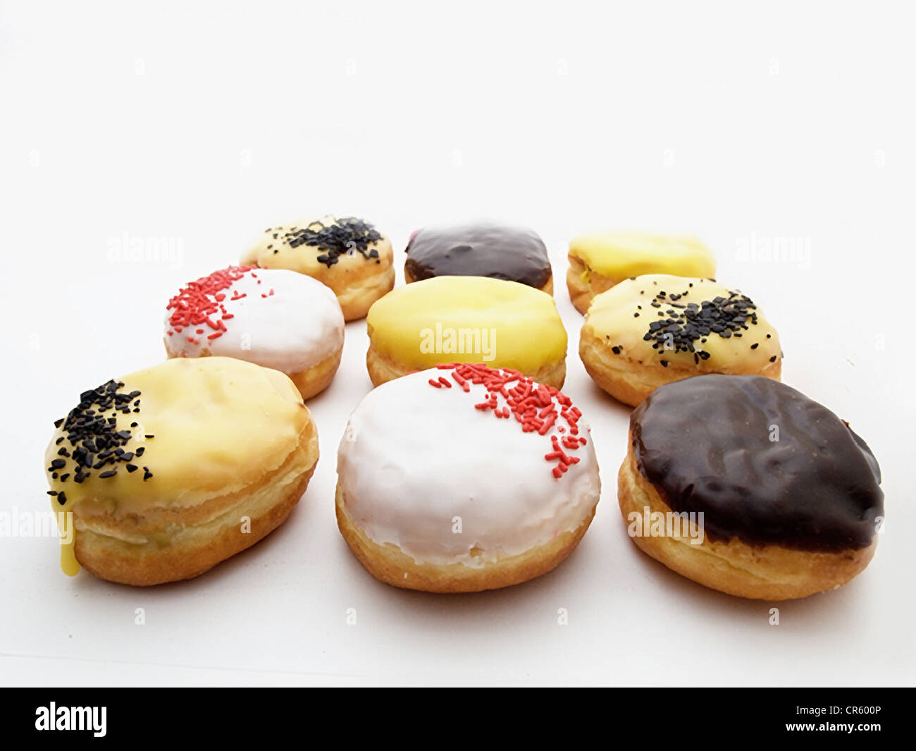 A lot of donuts on a white background Stock Photo - Alamy