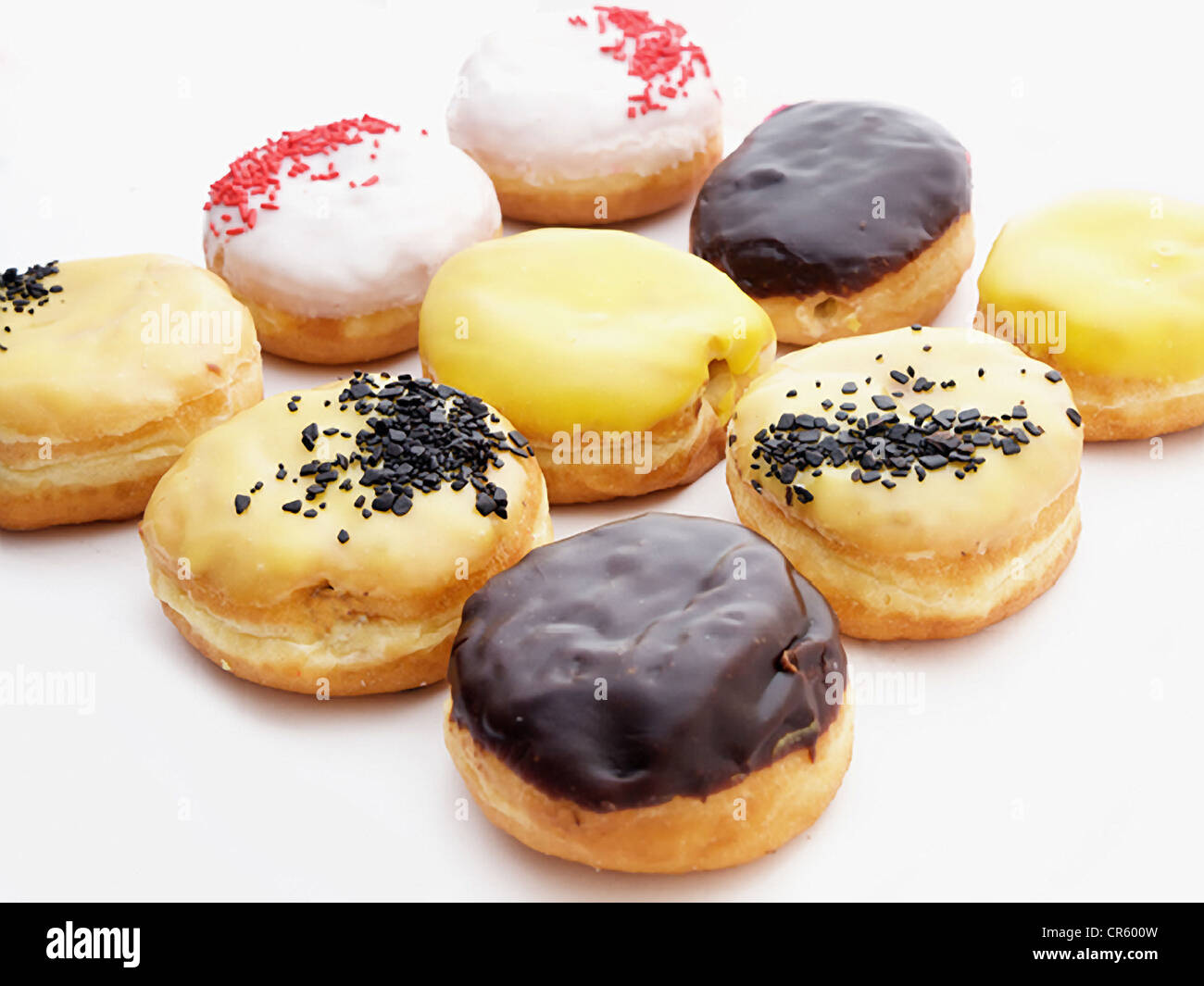 A lot of donuts on a white background Stock Photo - Alamy