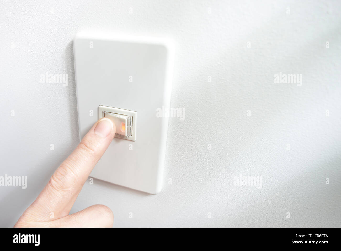 Person Turning on Switch Stock Photo - Alamy